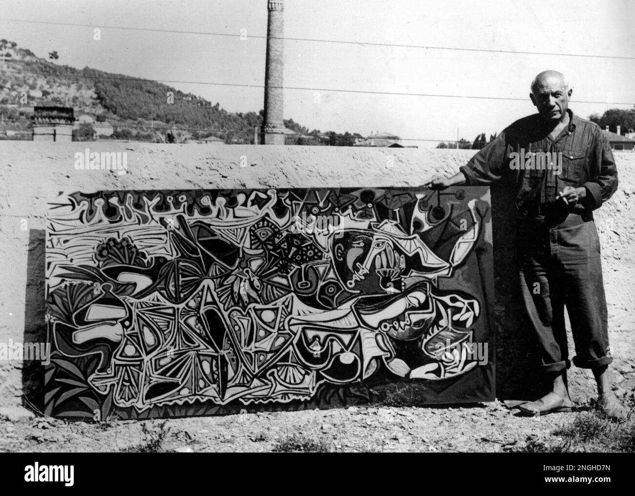 Spanish born artist Pablo Picasso poses with one of his latest ...