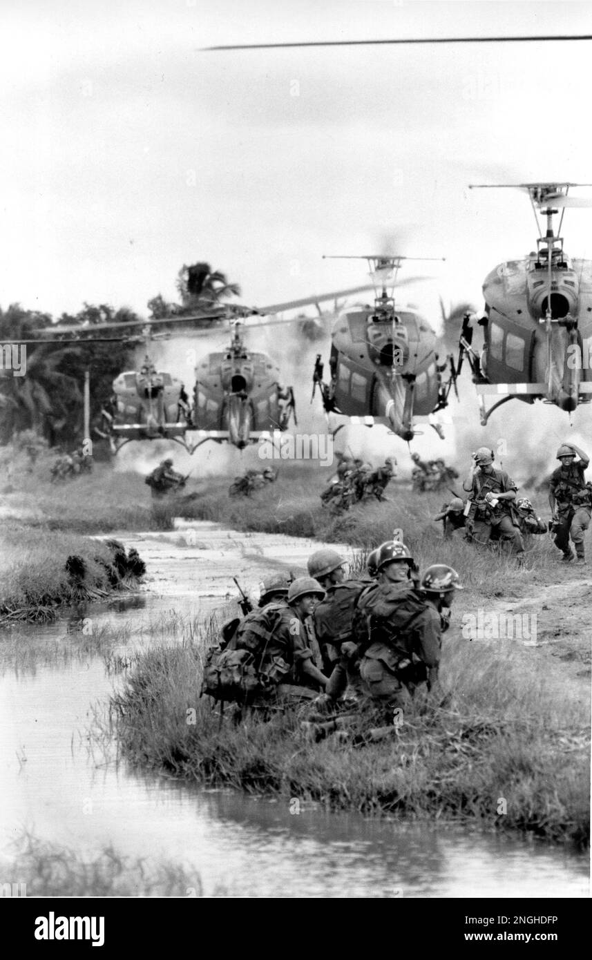 Ferrying South Vietnamese rangers, helicopters of the U.S. 199th Light ...