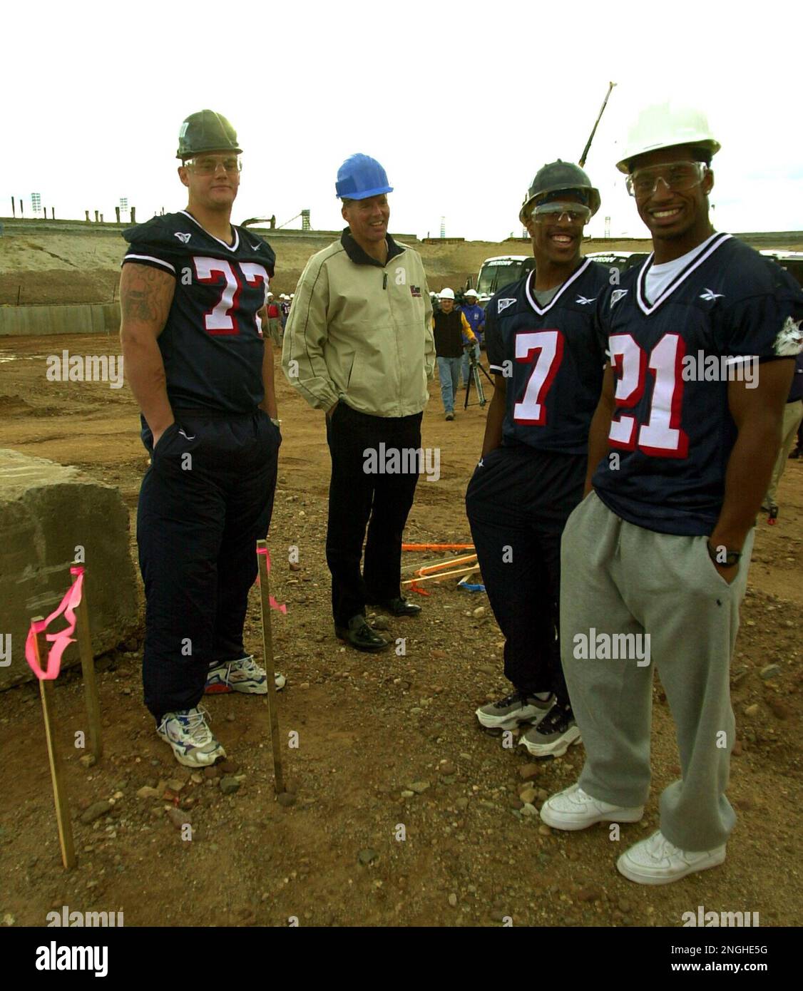 Connecticut head football coach Randy Edsall, second from left, stands ...