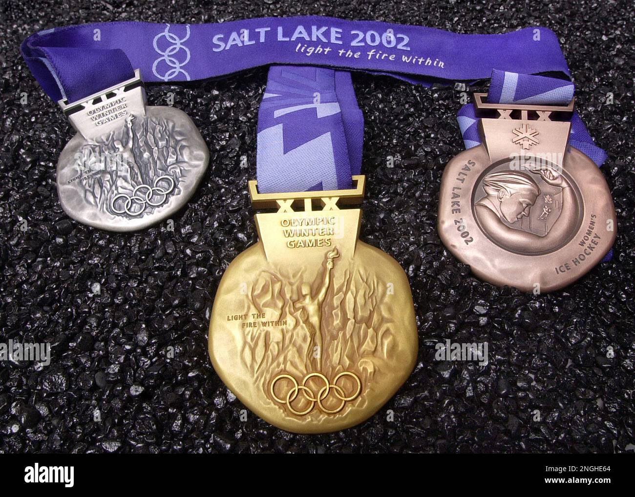 The Olympic medals for the 2002 Winter Games are displayed Friday, Oct ...