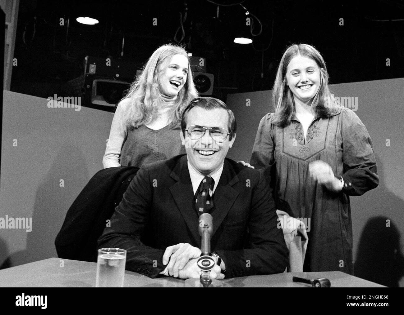 Defense Secretary Donald Rumsfeld, is flanked by daughters Marcy, left ...
