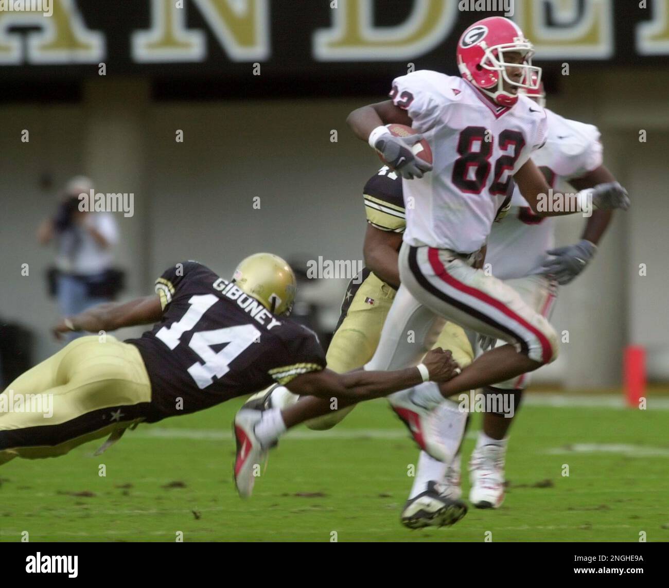 Georgia wide receiver Fred Gibson (82) breaks a tackle by Vanderbilt ...