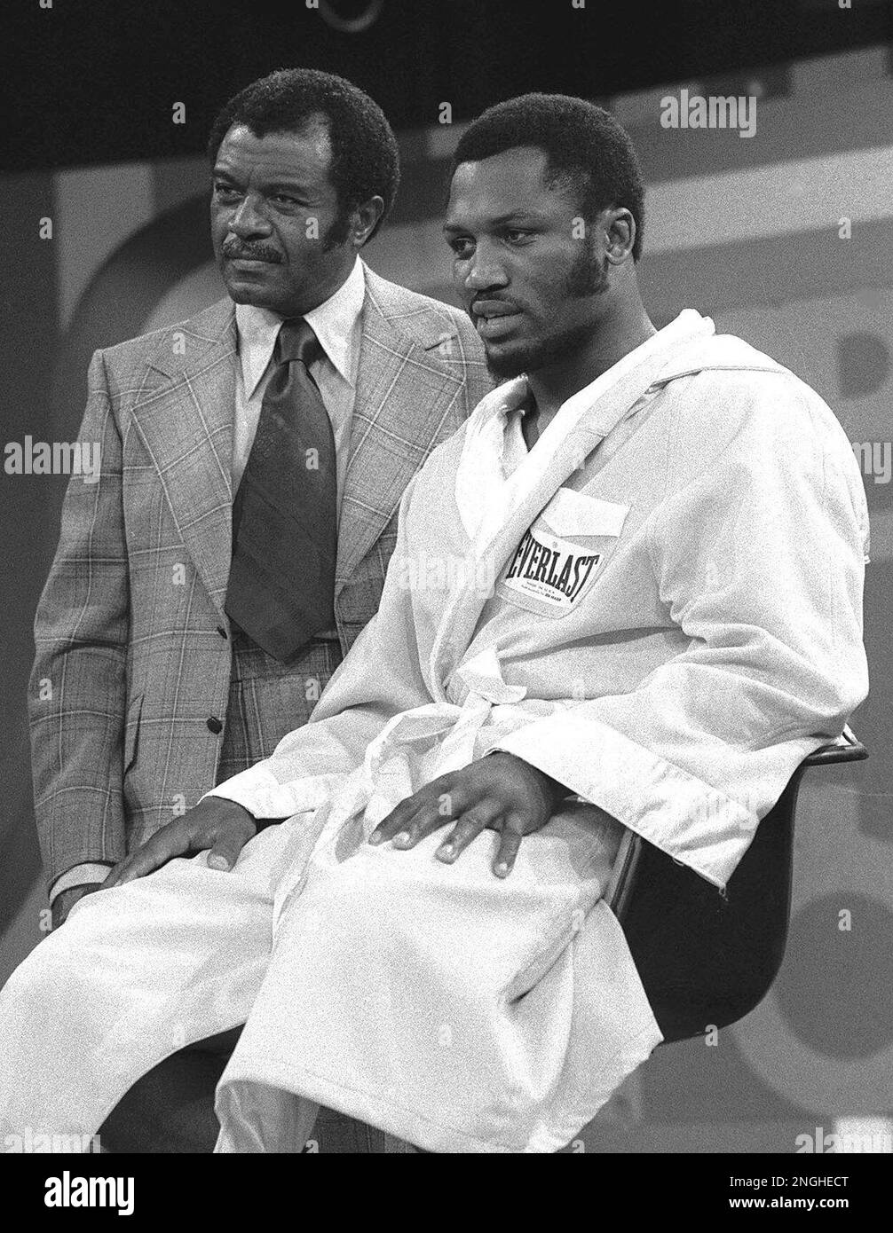 Trainer Eddie Futch, left, stands with his boxer Joe Frazier before ...