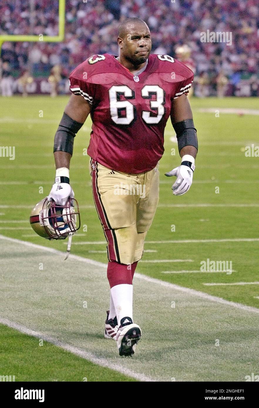 San Francisco 49ers tackle Derrick Deese walks off the field after he ...