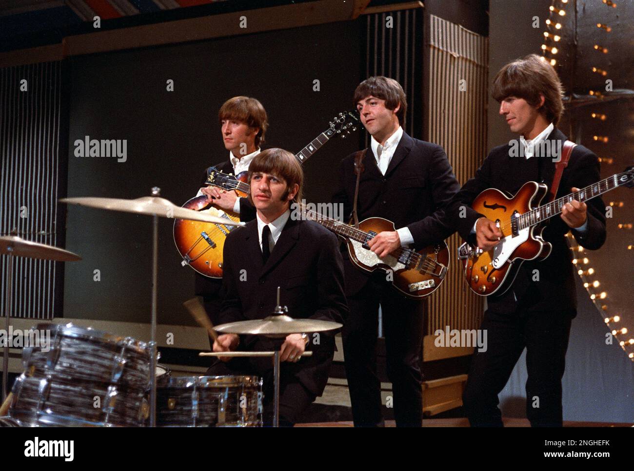 The Beatles pose together before their performance in a TV studio in ...