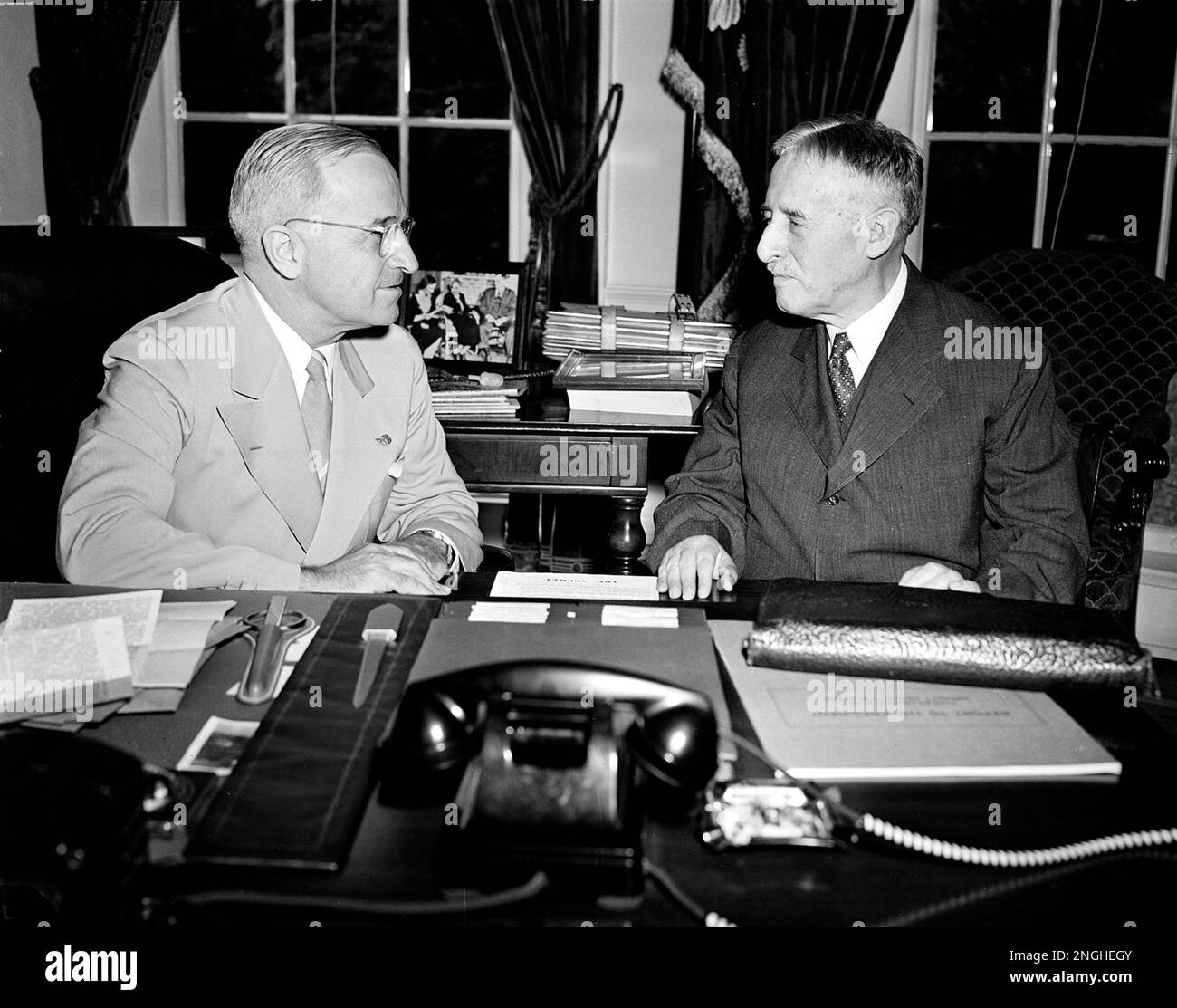 U.S. President Harry Truman, left, back from the Potsdam conference, is ...