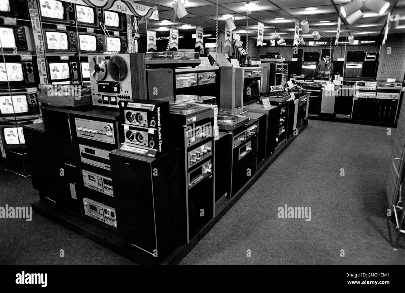 A display of stereo and television sets are shown in an electronics ...