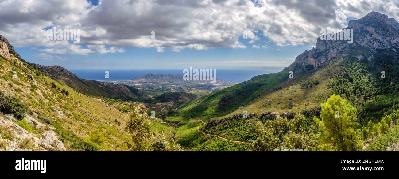 mountains and a beatiful sky since ponoig mountain and Benidorm city on ...