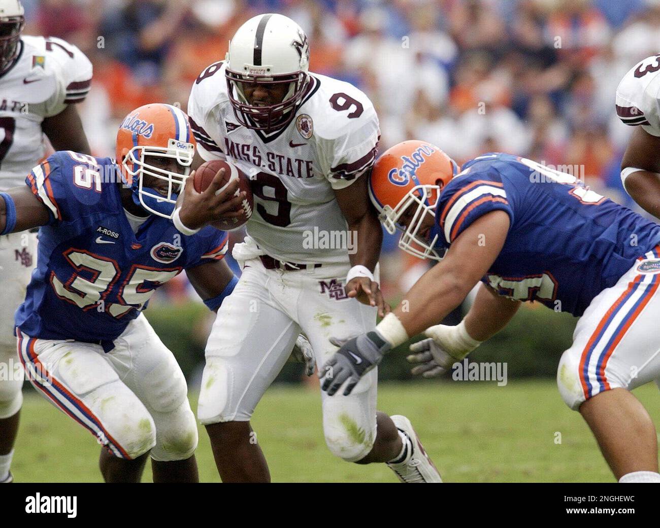 Mississippi State quarterback Wayne Madkin is sacked by Florida's Ian ...