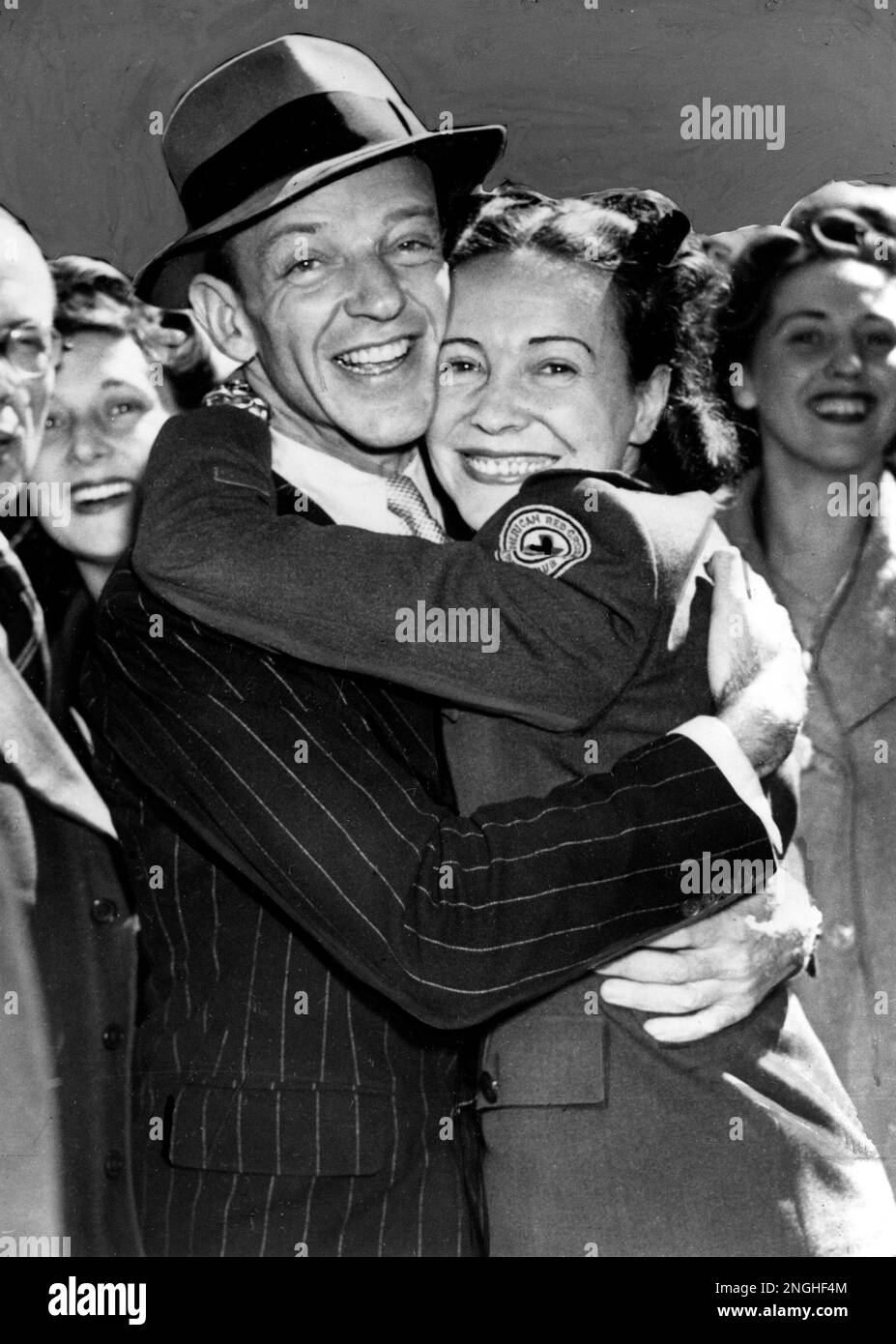 American actor-dancer Fred Astaire, left, gets a welcome hug from his ...