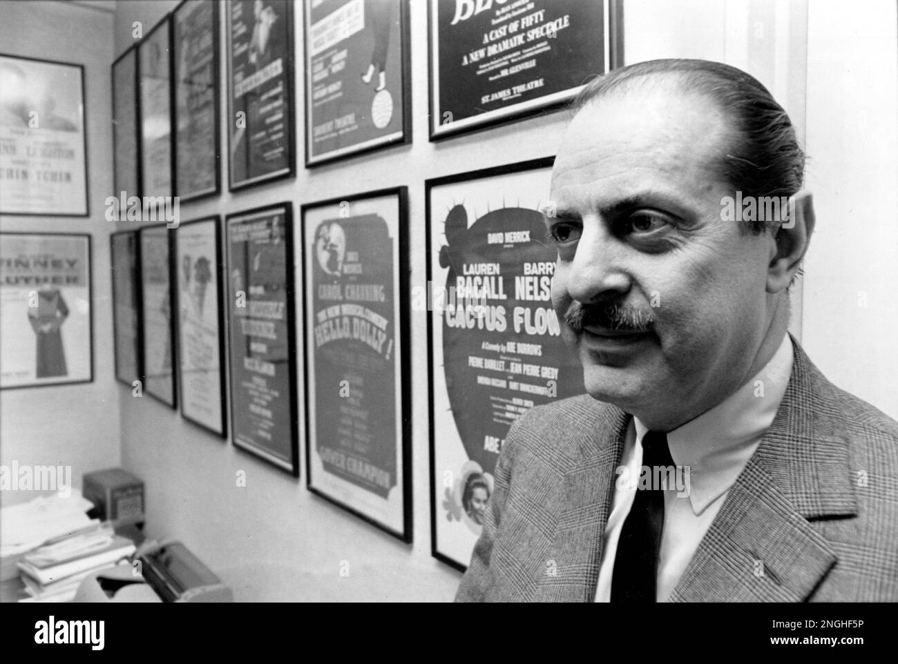 American theatrical producer David Merrick is shown in his Broadway ...