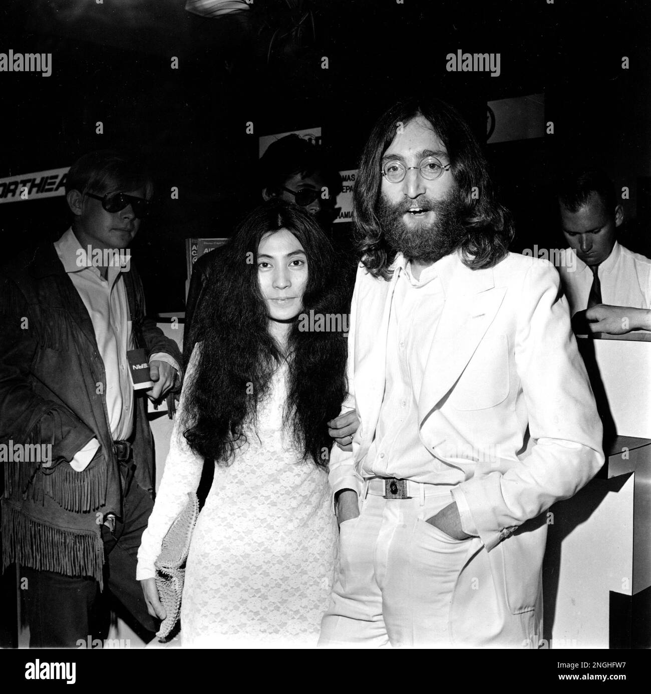 Beatle John Lennon and his wife, Yoko Ono, left, are shown in June 1969 at an airport at an ...