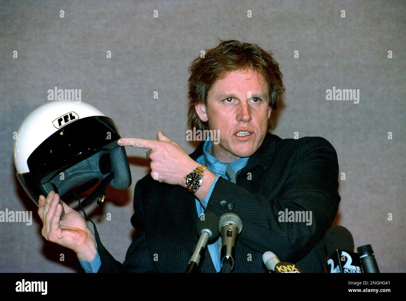 Actor Gary Busey lends his support to the use of motorcycle helmets and ...