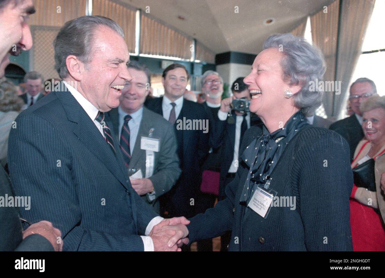 Former U.S. President Richard Nixon talks with Katharine Graham ...