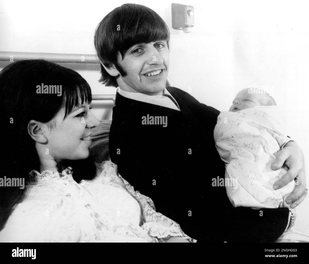 Ringo Starr, drummer of The Beatles, holds his newborn son, Zak, as his ...