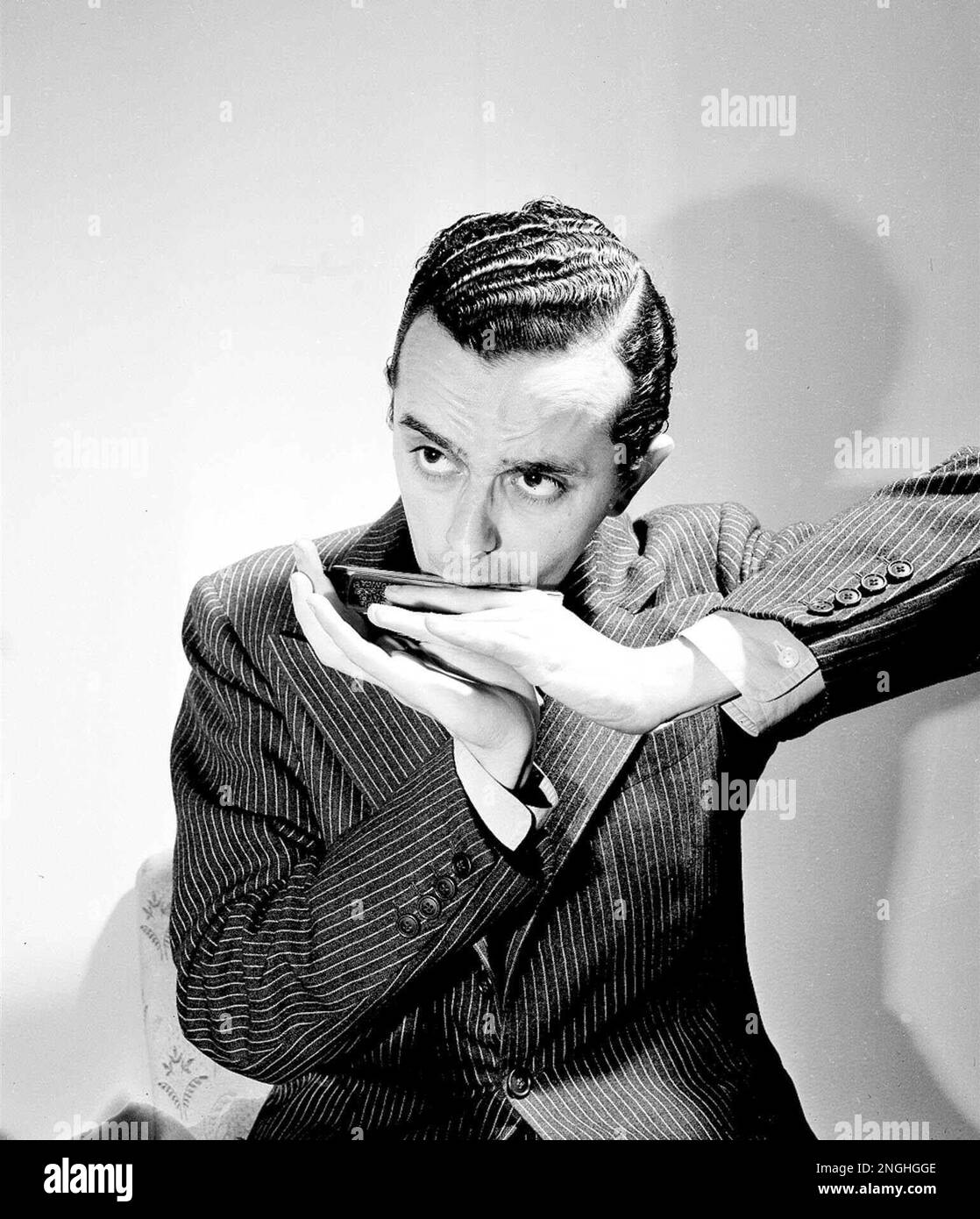 Larry Adler is shown in this April 23, 1947 photo before his concert at ...