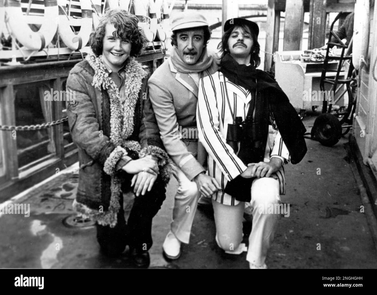 British comedian actor Peter Sellers, center, poses with his 15-year ...