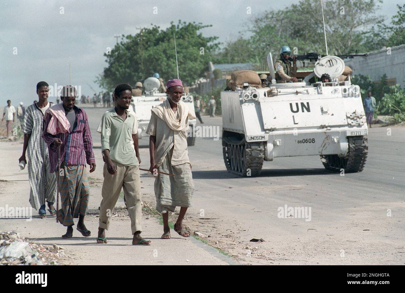 United Nations soldiers in armored vehicles patrol the streets of ...