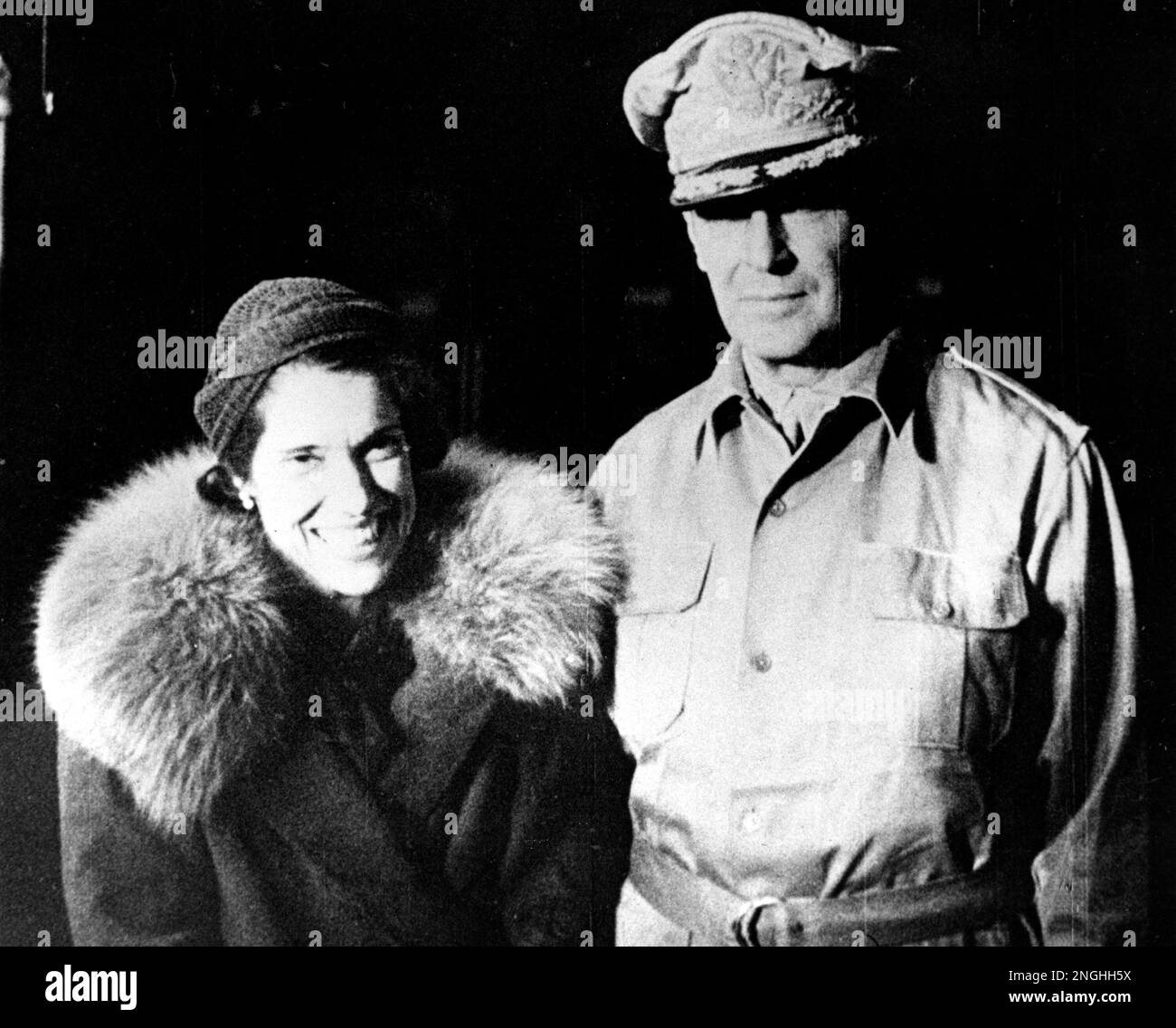 U.S. Gen. Douglas MacArthur poses with his wife, Jean, as they arrive ...