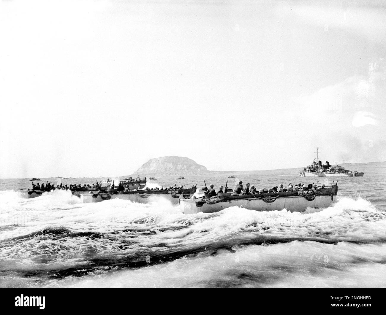 U.S. Marines aboard a landing craft head for the beaches of Iwo Jima ...