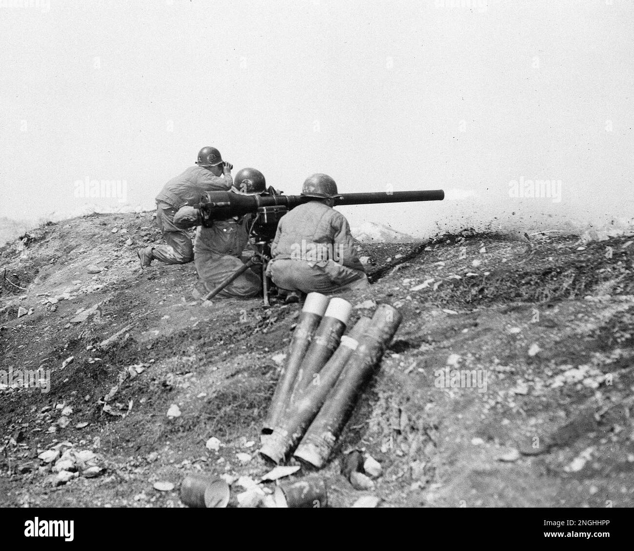 Republic of Korea (ROC) infantrymen fire a 75 mm recoilless rifle at ...