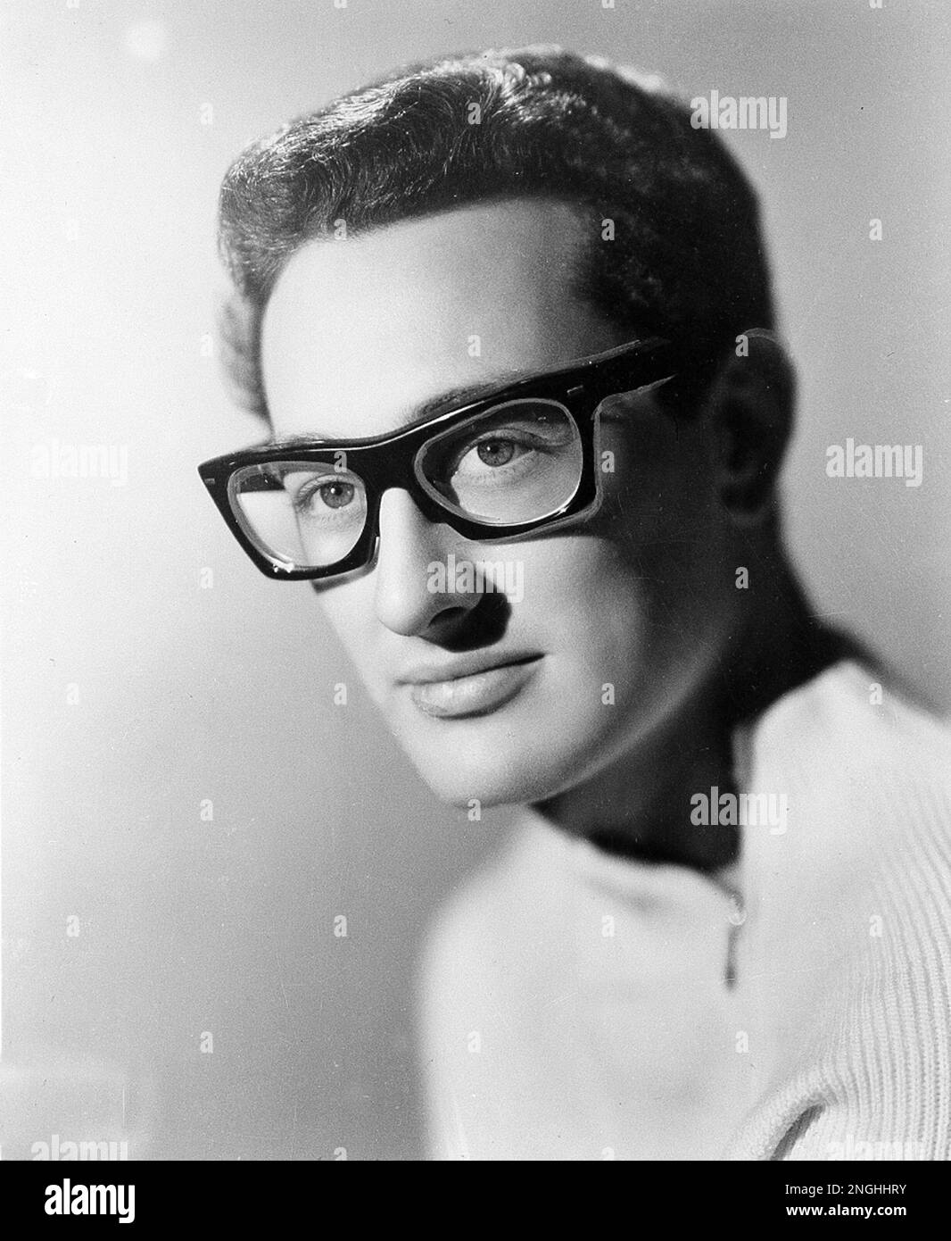 American rock and roll singer, songwriter and guitarist Buddy Holly is ...