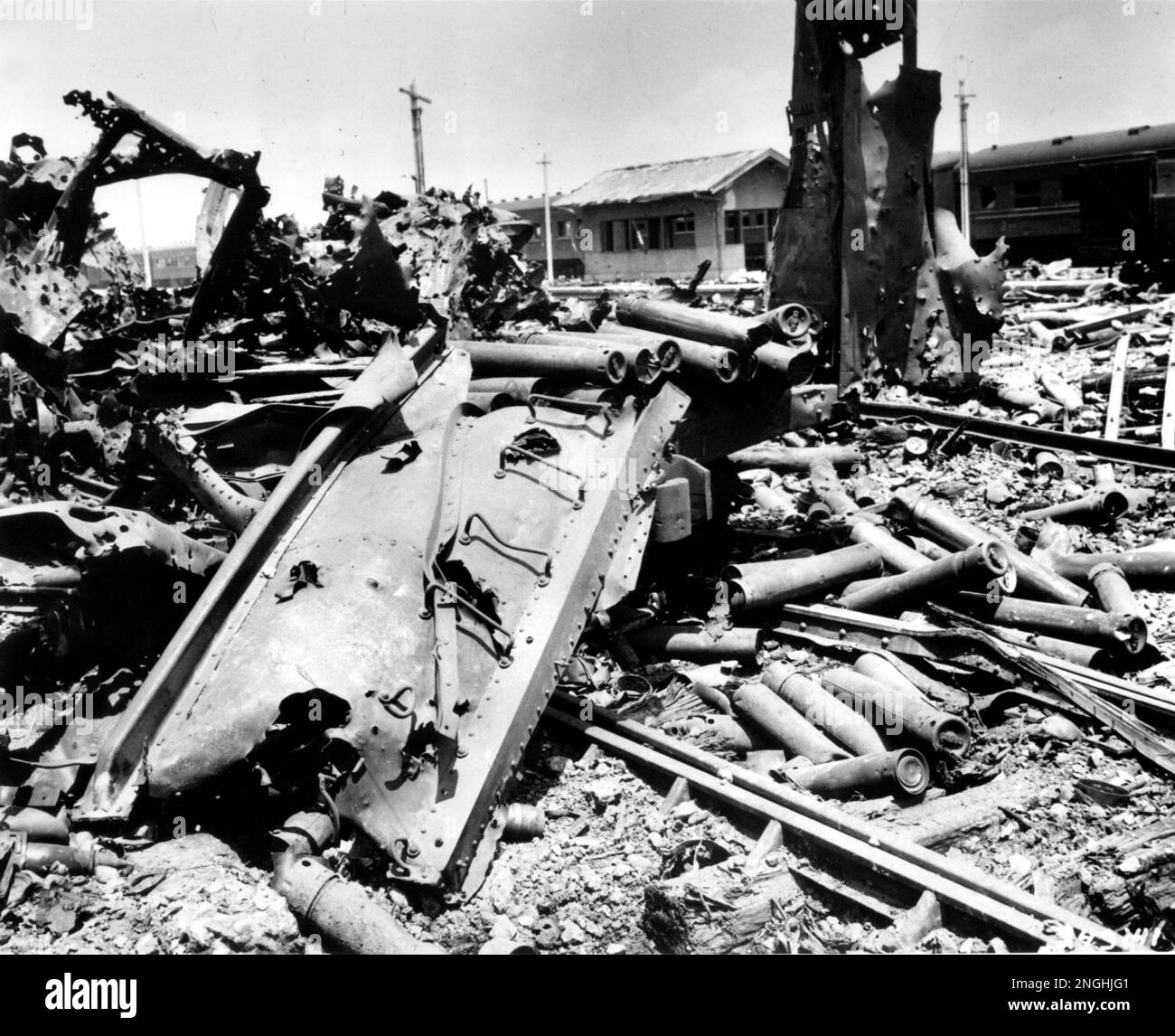 Wreckage litters the rail yard at Pyong Taek, between Seoul and Taejon ...
