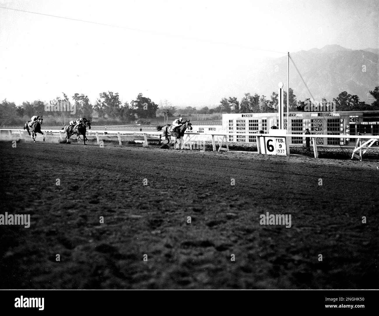 Seabiscuit, with jockey Johnny "Red" Pollard, approaches the finish ...