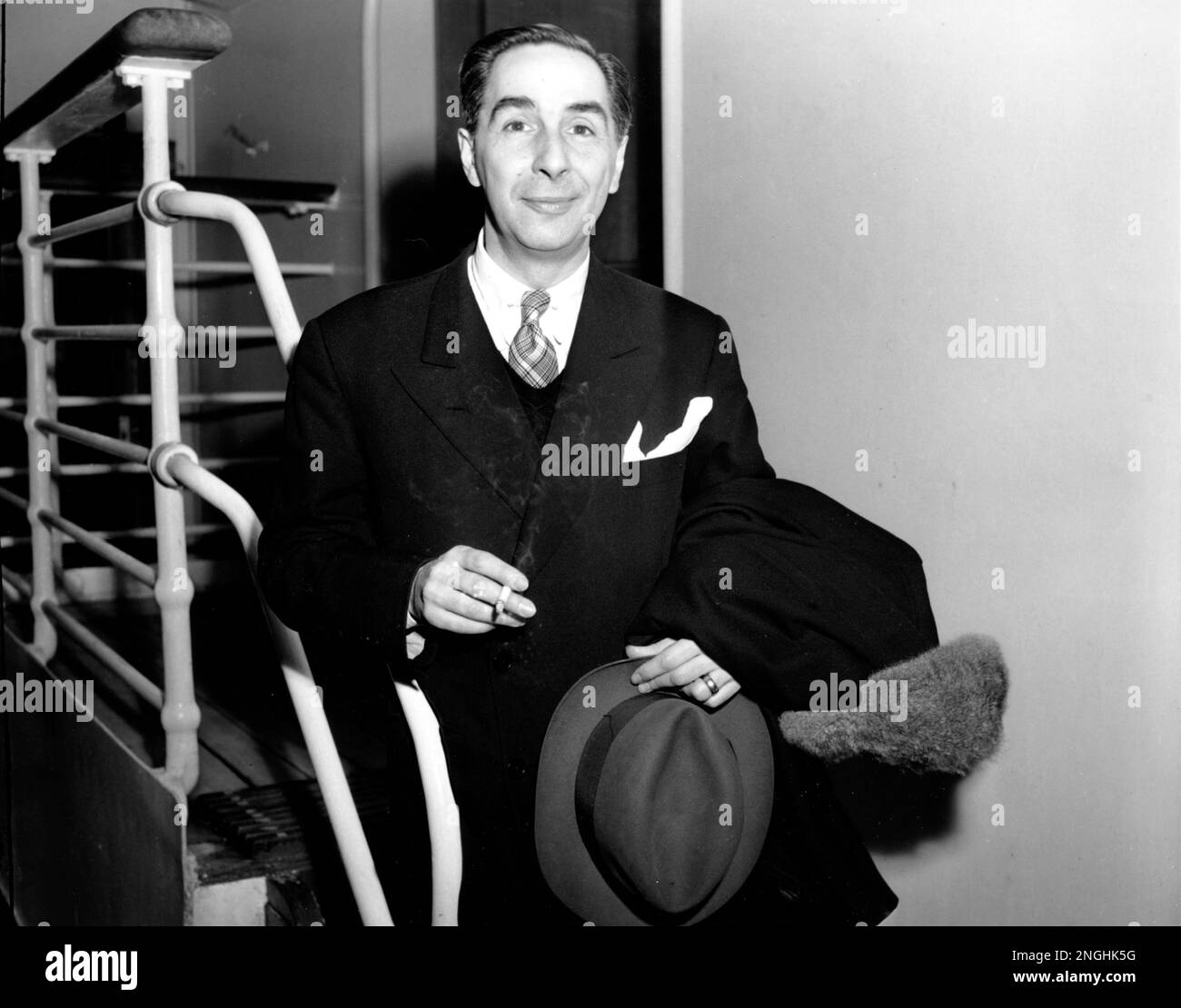 New York Fashion designer Norman Norell arrives in New York City on the ...