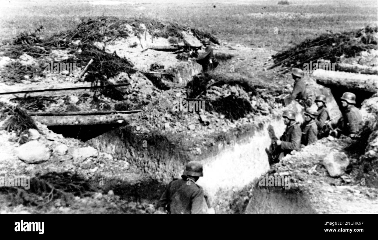 German Nazi soldiers are shown in Soviet trenches that they stormed and ...