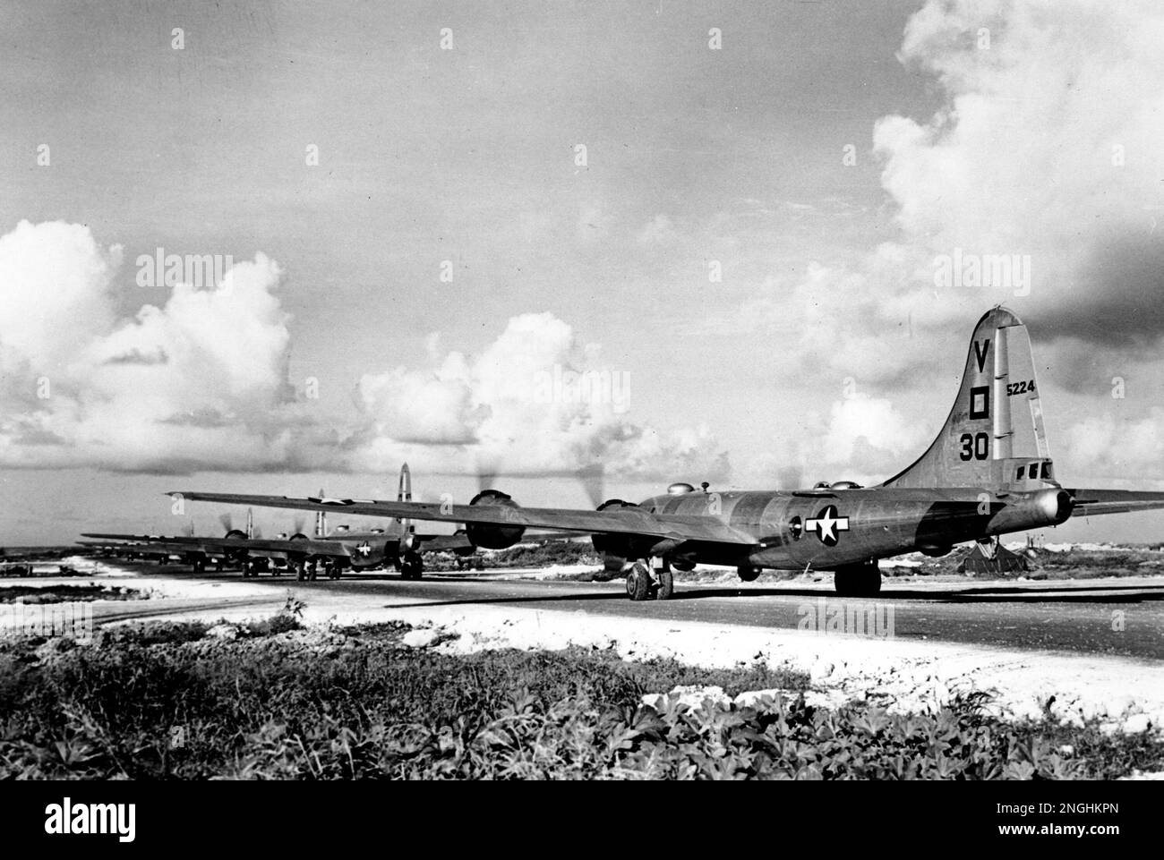 U.S. Army Air Force B-29s of the 21st Bomber Command wait on line with ...
