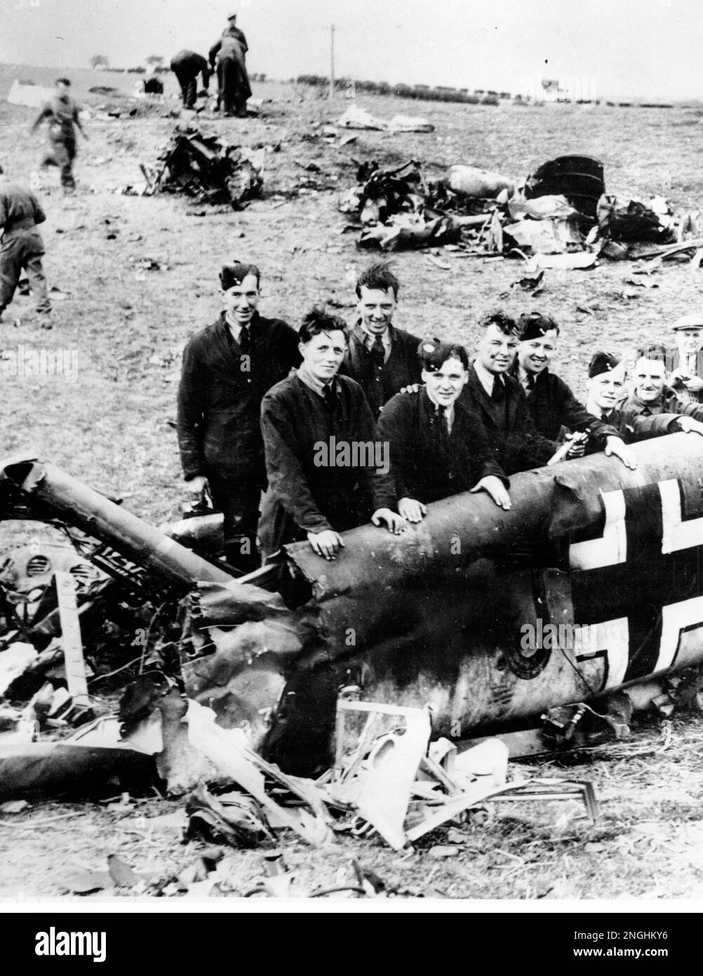 Allied soldiers pose with the wreckage of the Messerschmitt twin-engine ...