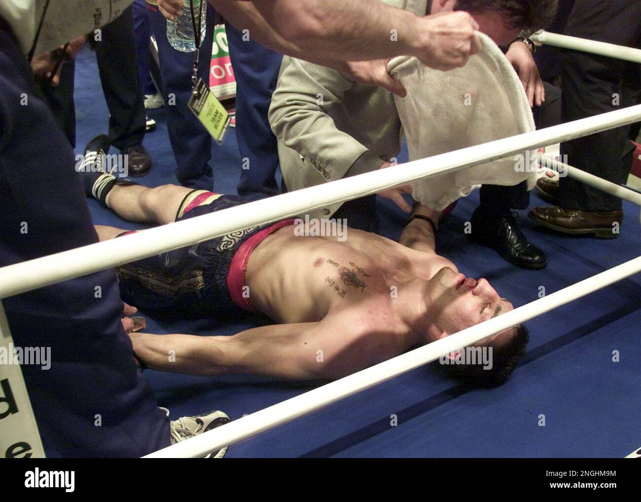 Spanish boxer Venti Alejendro Lakatos lies on the ground after being ...