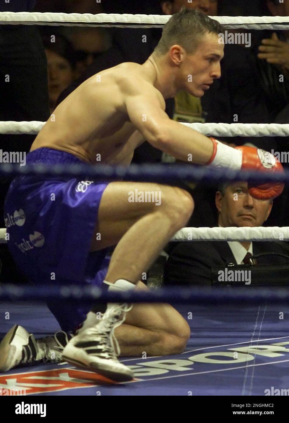 Germany's Mario Veit hits the canvas for the first knockdown in round ...
