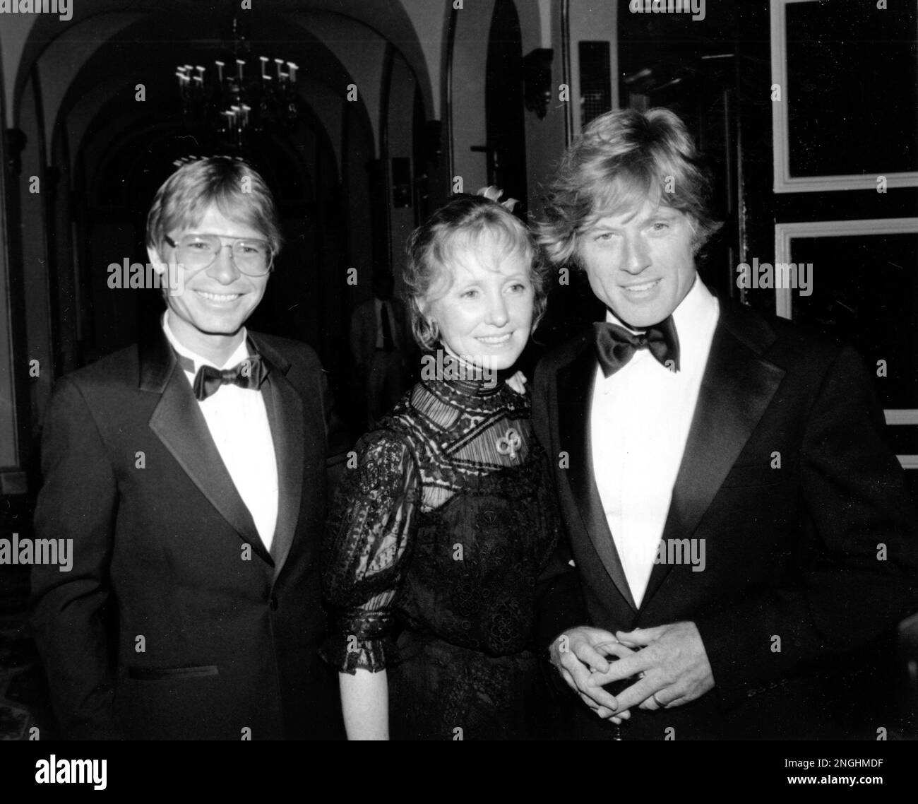 Singer John Denver, left, actor Robert Redford, right, and his wife ...
