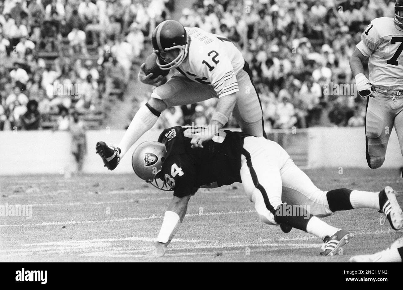 Pittsburgh Steelers quarterback Terry Bradshaw (12) leaps high into the ...