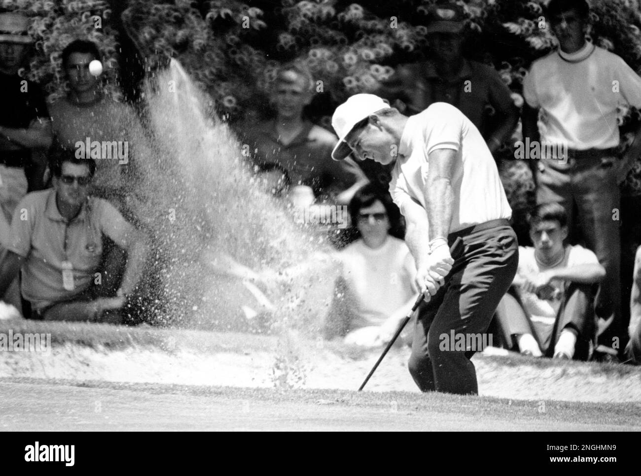 Gary Player of South Africa blasts from sand trap on 5th hole during ...