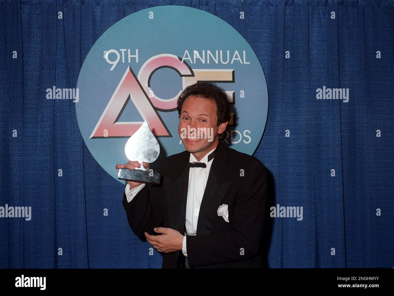 Actor-comedian Billy Crystal displays his Ace award at the 9th Annual ...