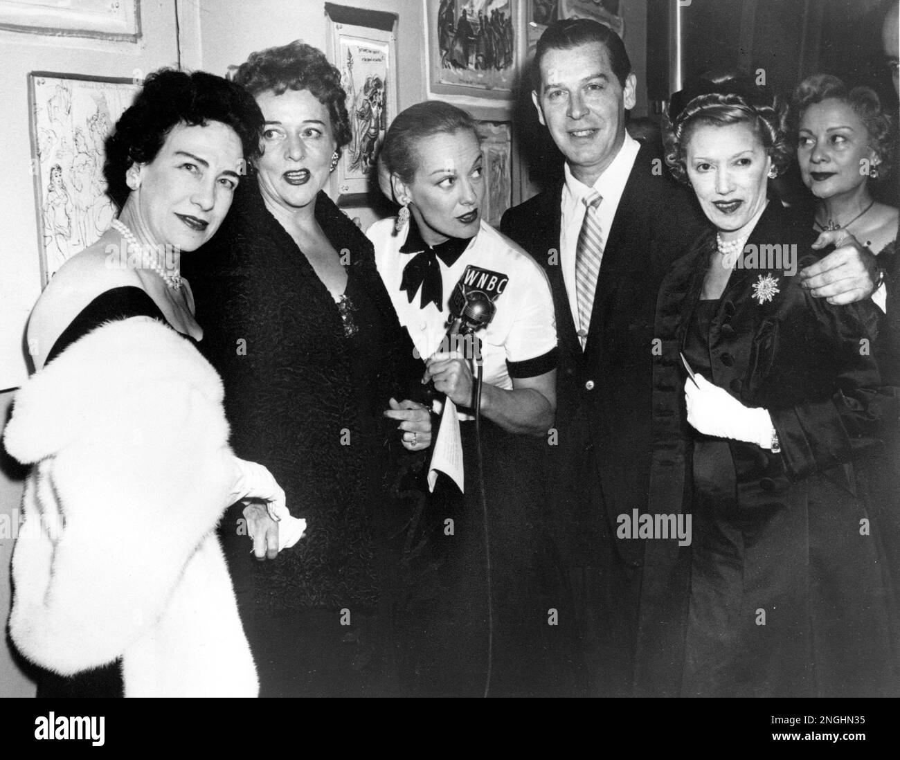 Actor-comedian Milton Berle poses with, from left, Ceil Chapman, Jessie ...