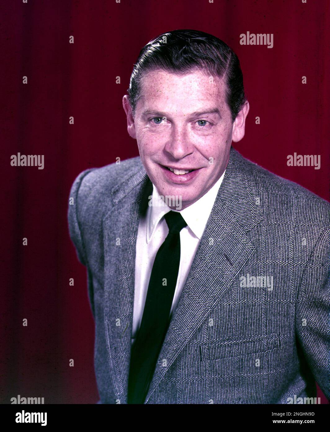 Actor and comedian Milton Berle is photographed in 1960 at an unknown ...