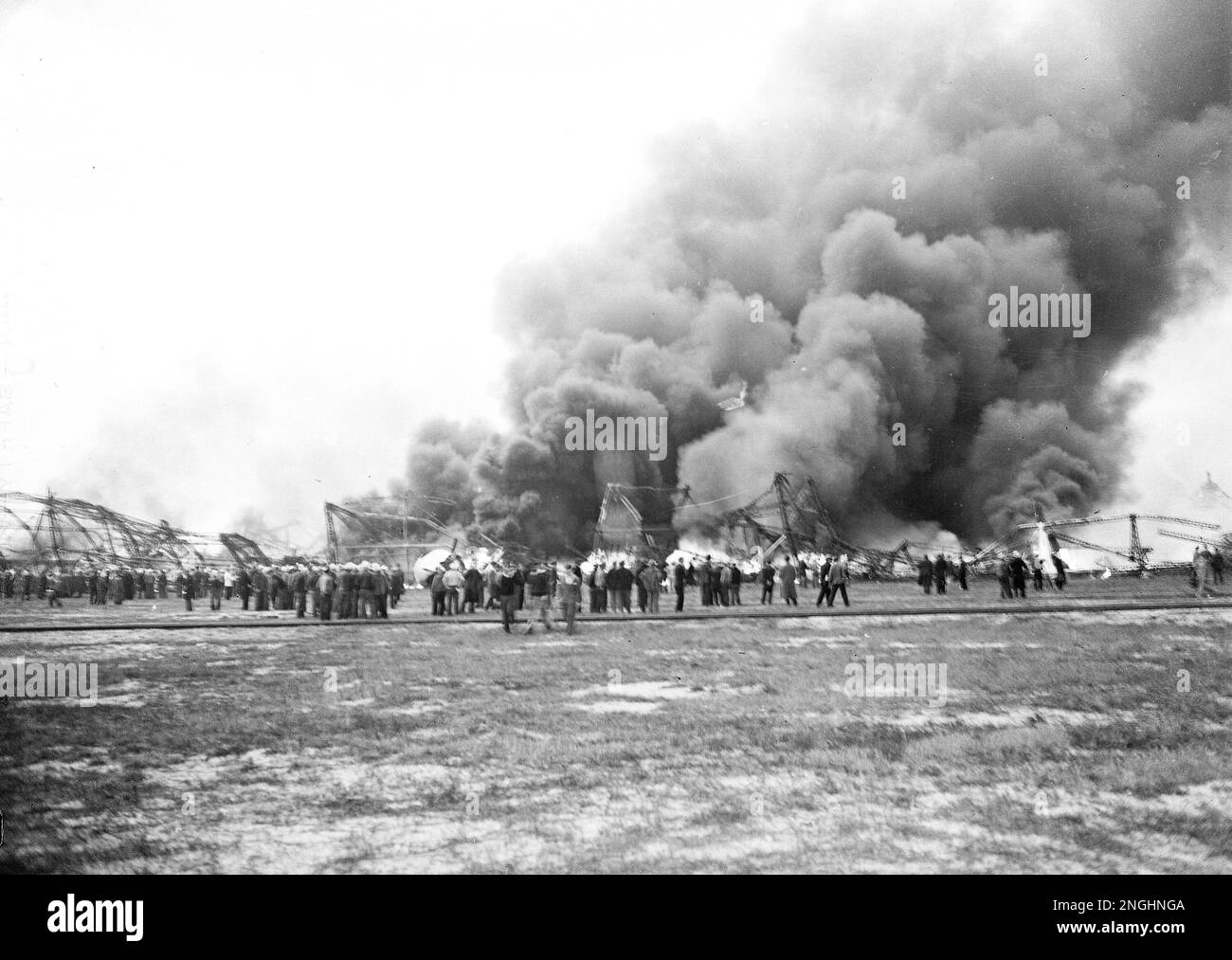 The Hindenburg zeppelin burns after it exploded during the docking ...