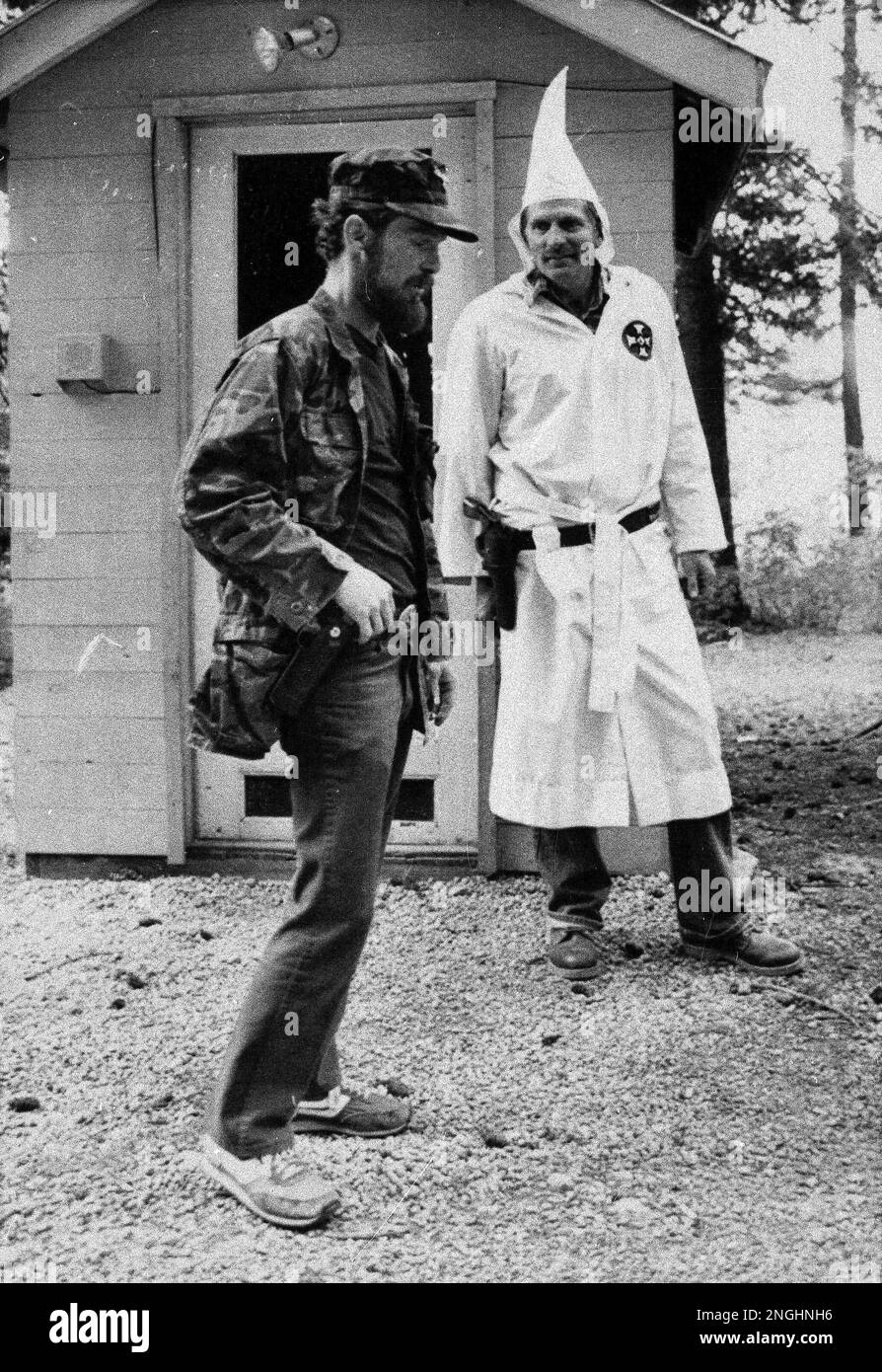 Gary Lee Yarbrough and David Lane, in Ku Klux Klan robe, are shown ...