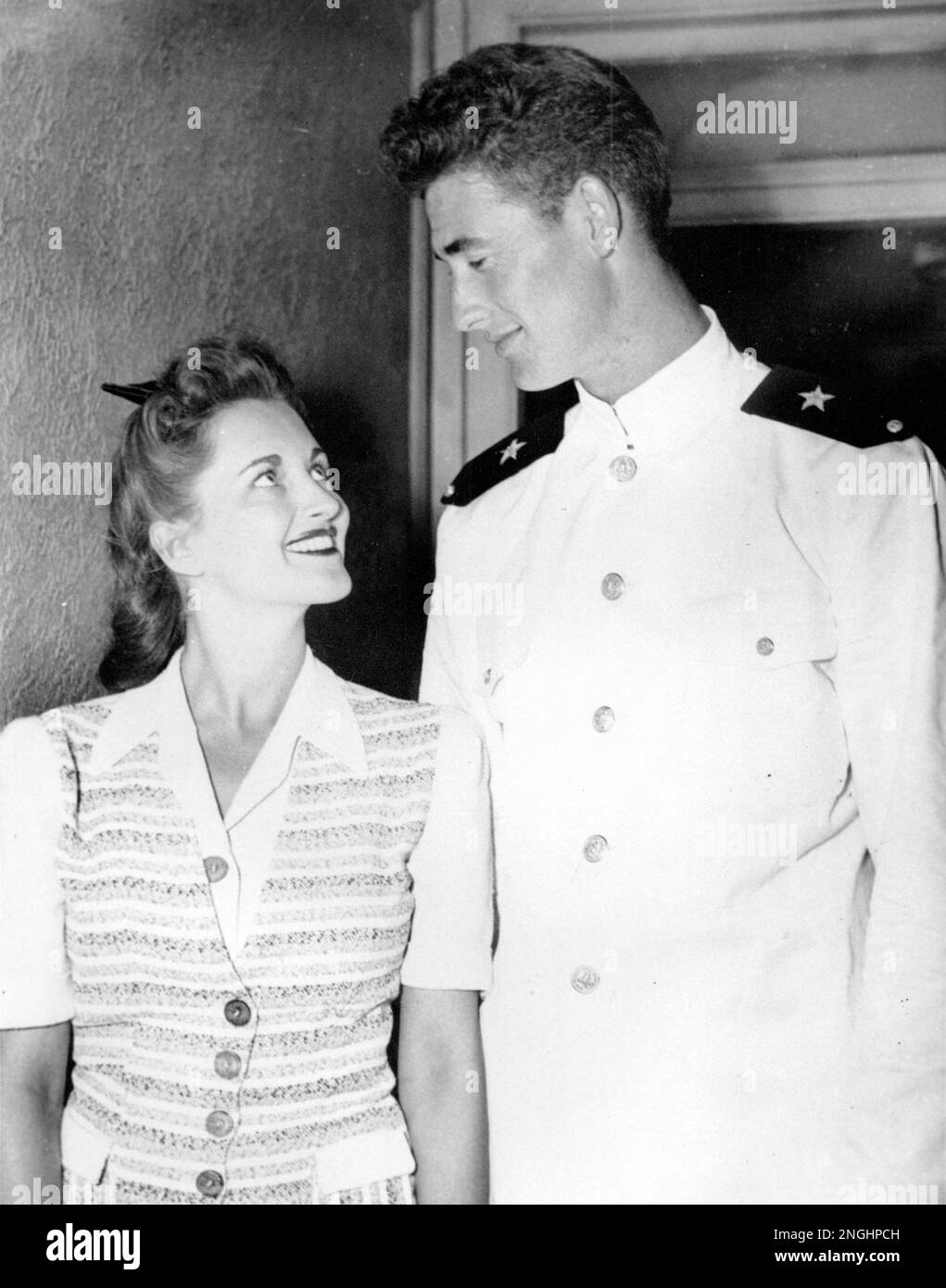 U.S. Naval Air Cadet Ted Williams, Red Sox outfielder, looks at his ...