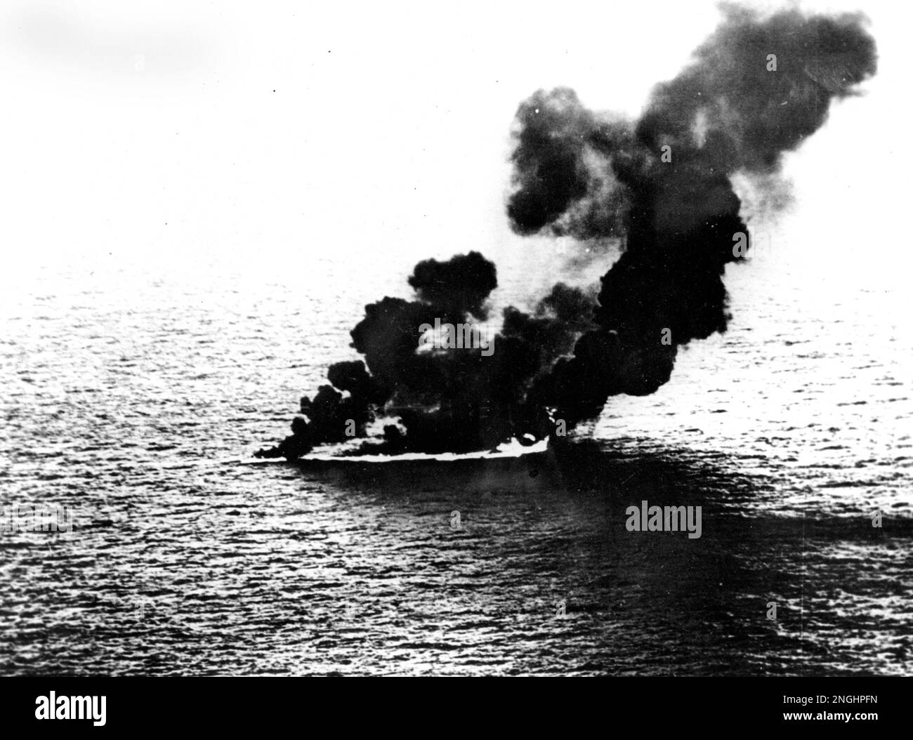 Smoke rises from a Japanese ship burning in the waters off Guadalcanal ...