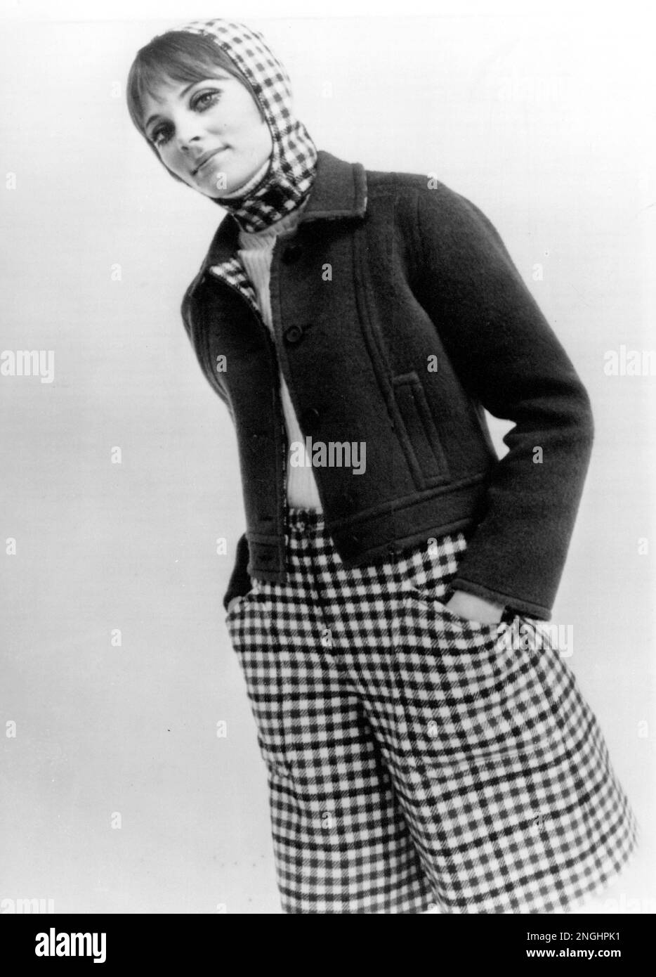 Marc Bohan's double-breasted tobacco-brown jacket worn with a matching ...