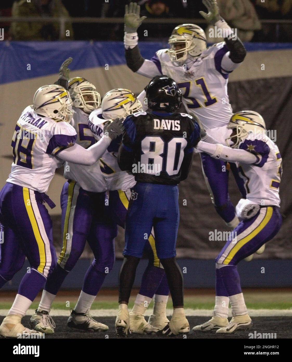 Duane Butler (31) joins a crowd of Birmingham Thunderbolts as they ...