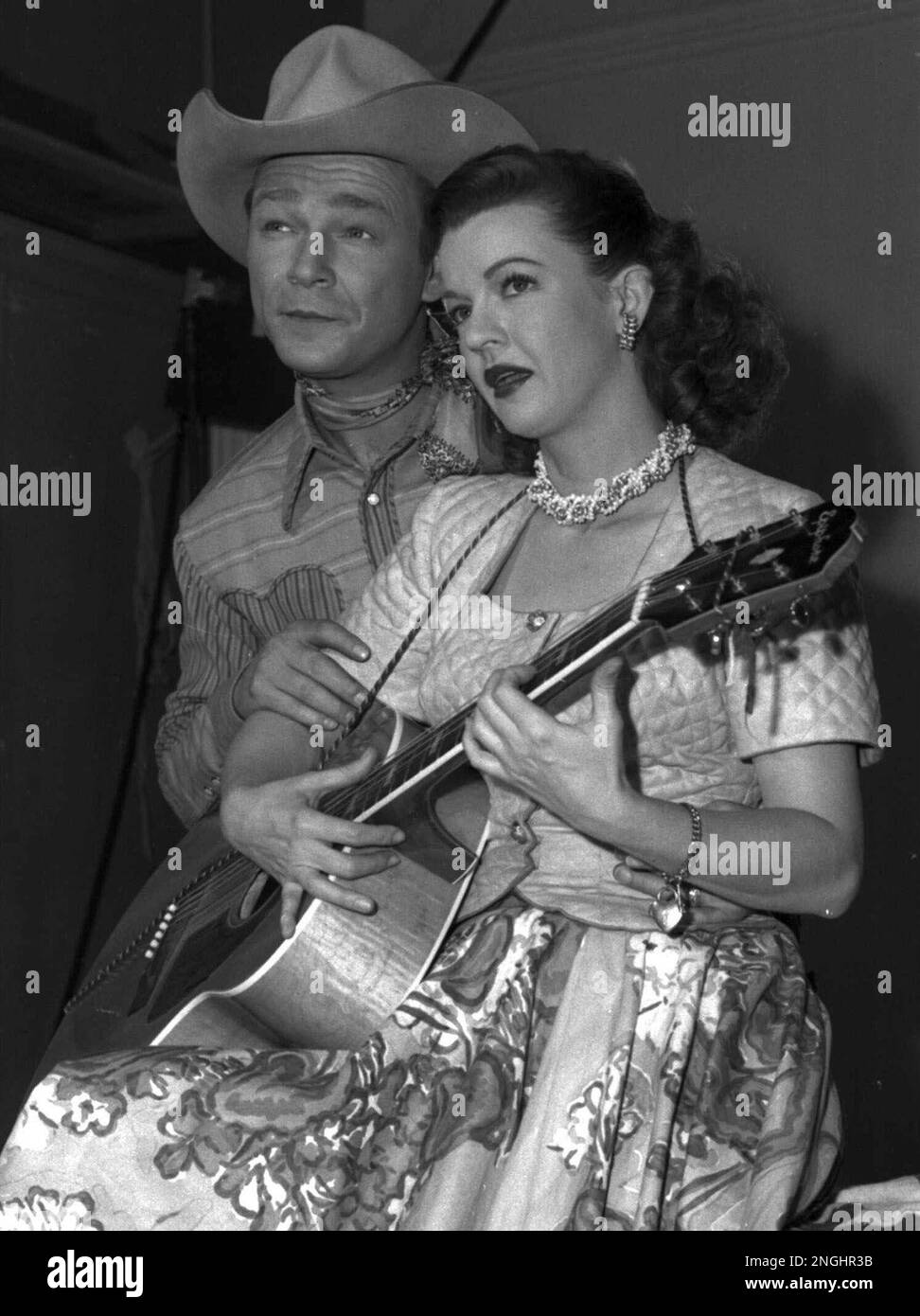 Roy Rogers and wife, Dale Evans, are shown performing a scene for the ...