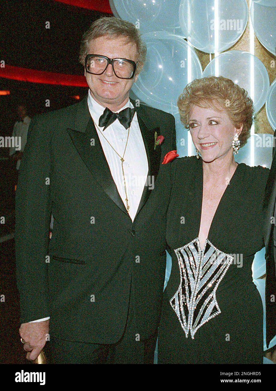 Actor Charles Nelson Reilly poses with Nina Blanchard at a dinner in ...