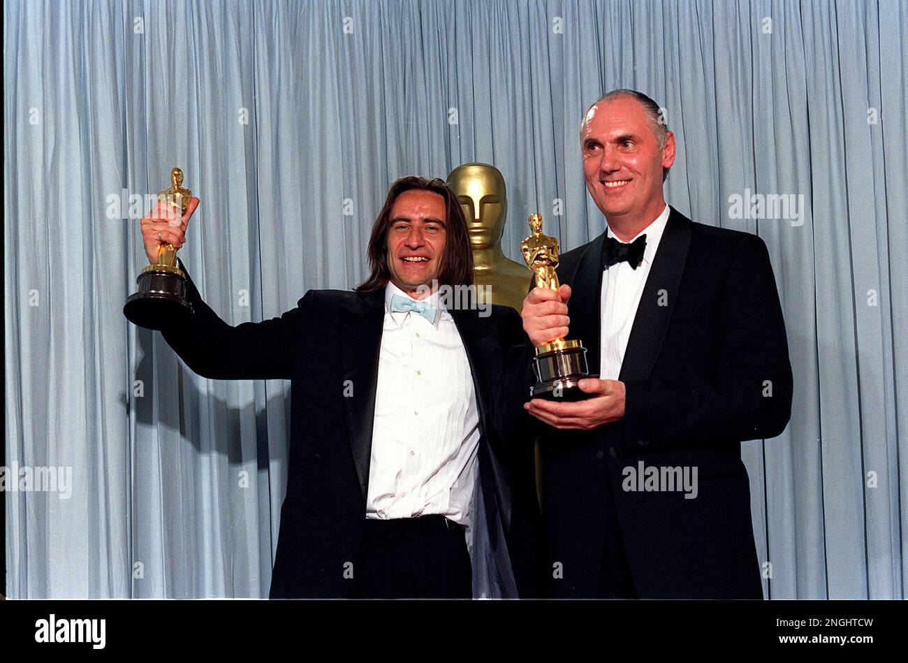 Art director Anton Furst, left, and set decorator Peter Young hold ...