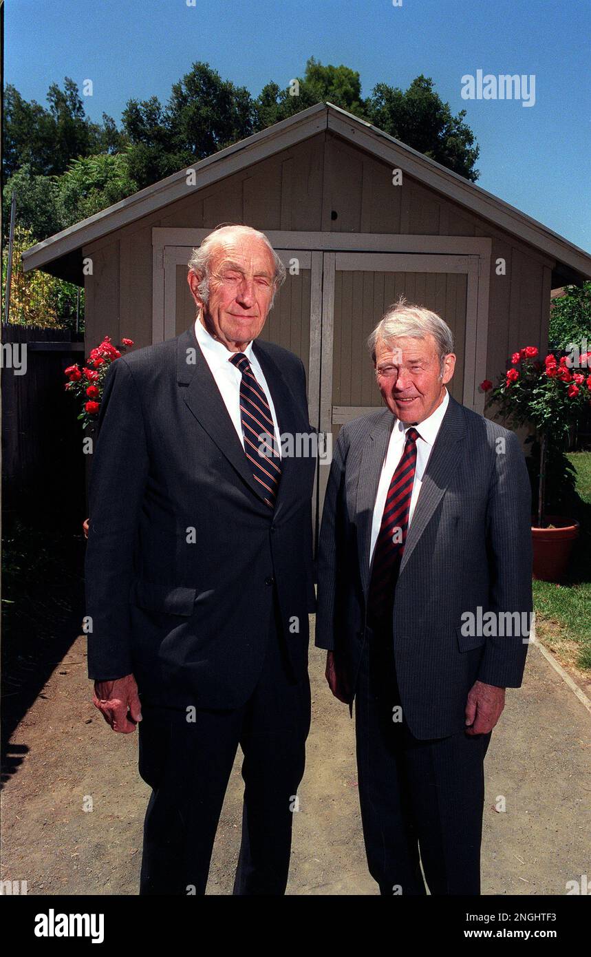 David Packard, left, and William R. Hewlett pose in front of a garage ...